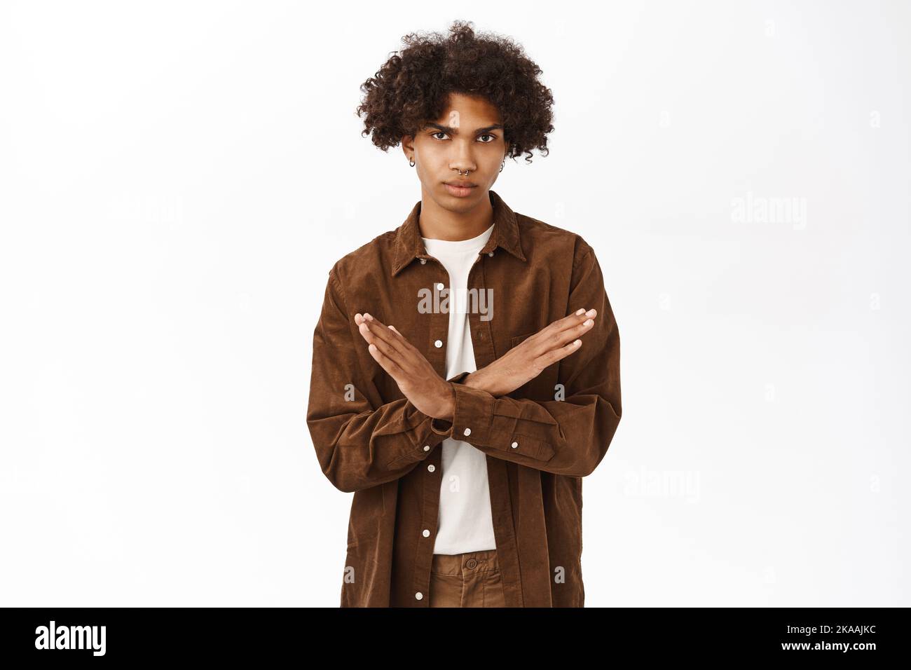 Enough, please stop. Serious hispanic guy showing prohibit, rejection ...