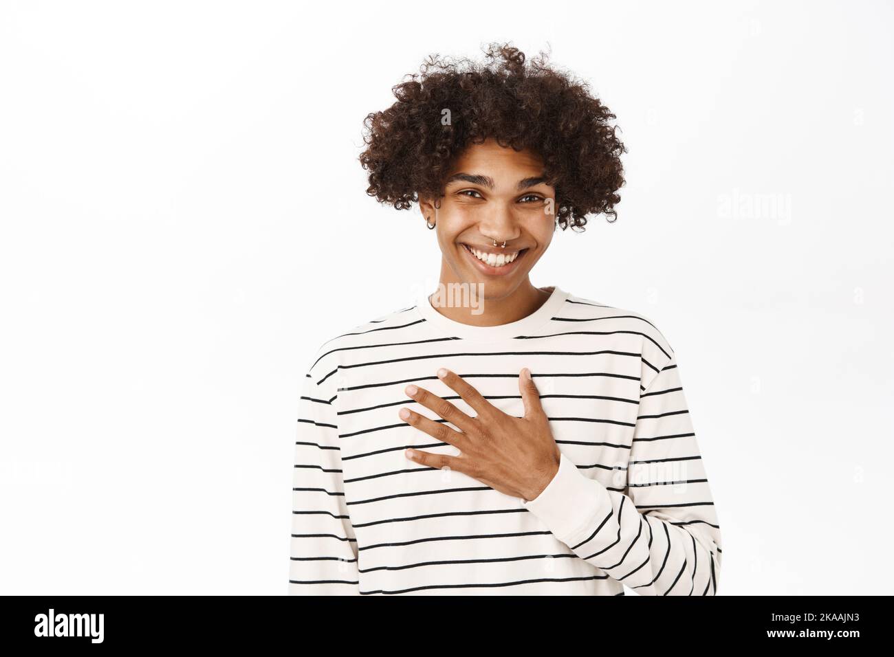 Close up portrait of handsome hispanic guy say thank you, looking ...