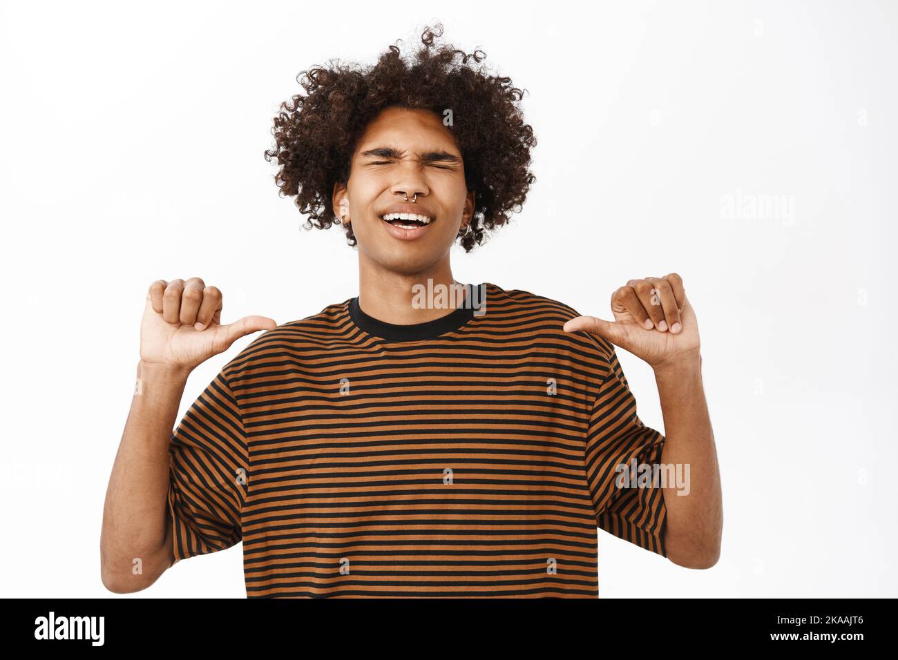 Upset guy pointing at himself, crying and whining, complaining about ...