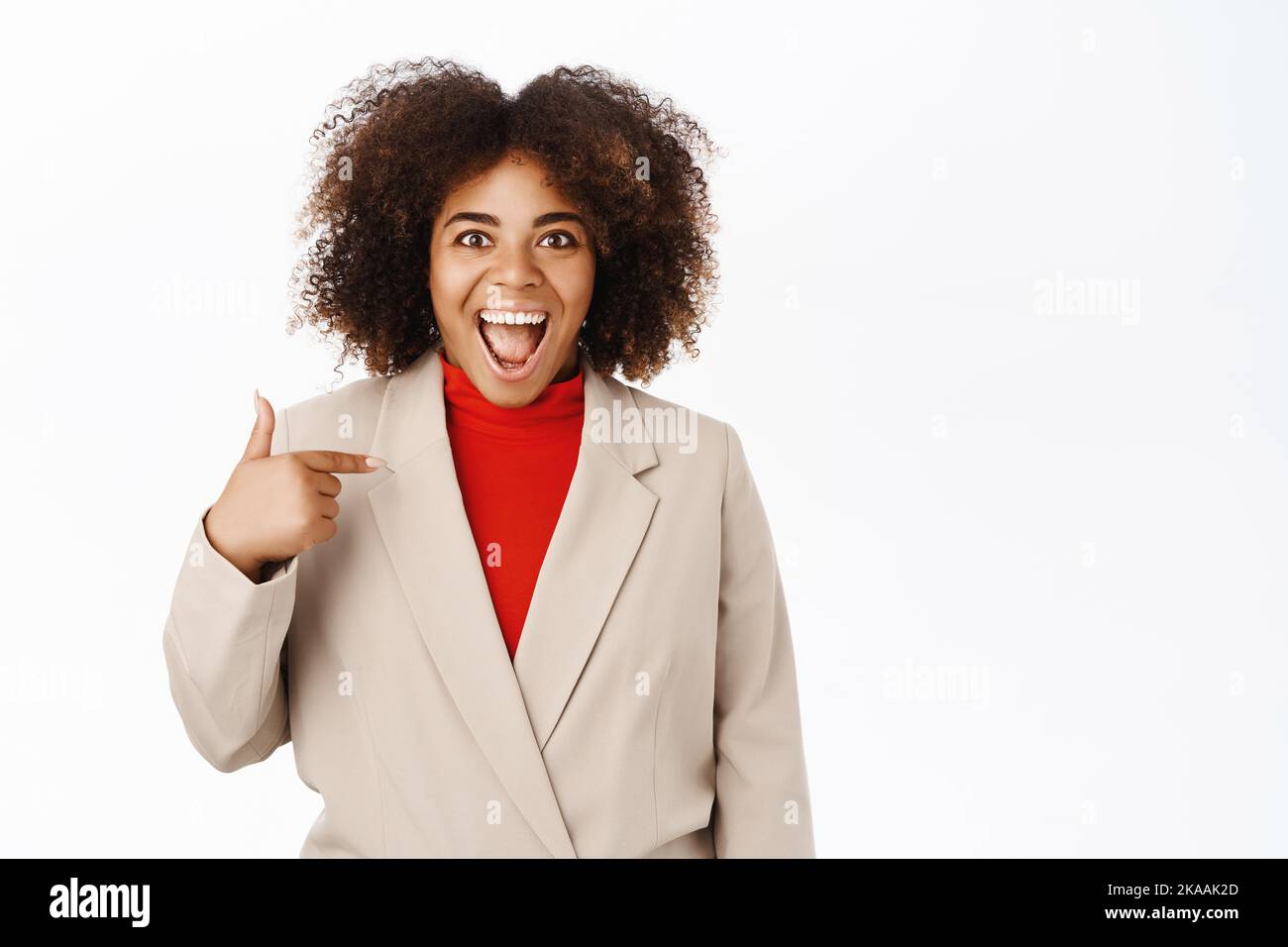 Excited african american businesswoman, corporate worker points at ...