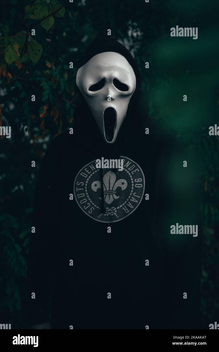 Person with scream mask for Halloween Stock Photo - Alamy