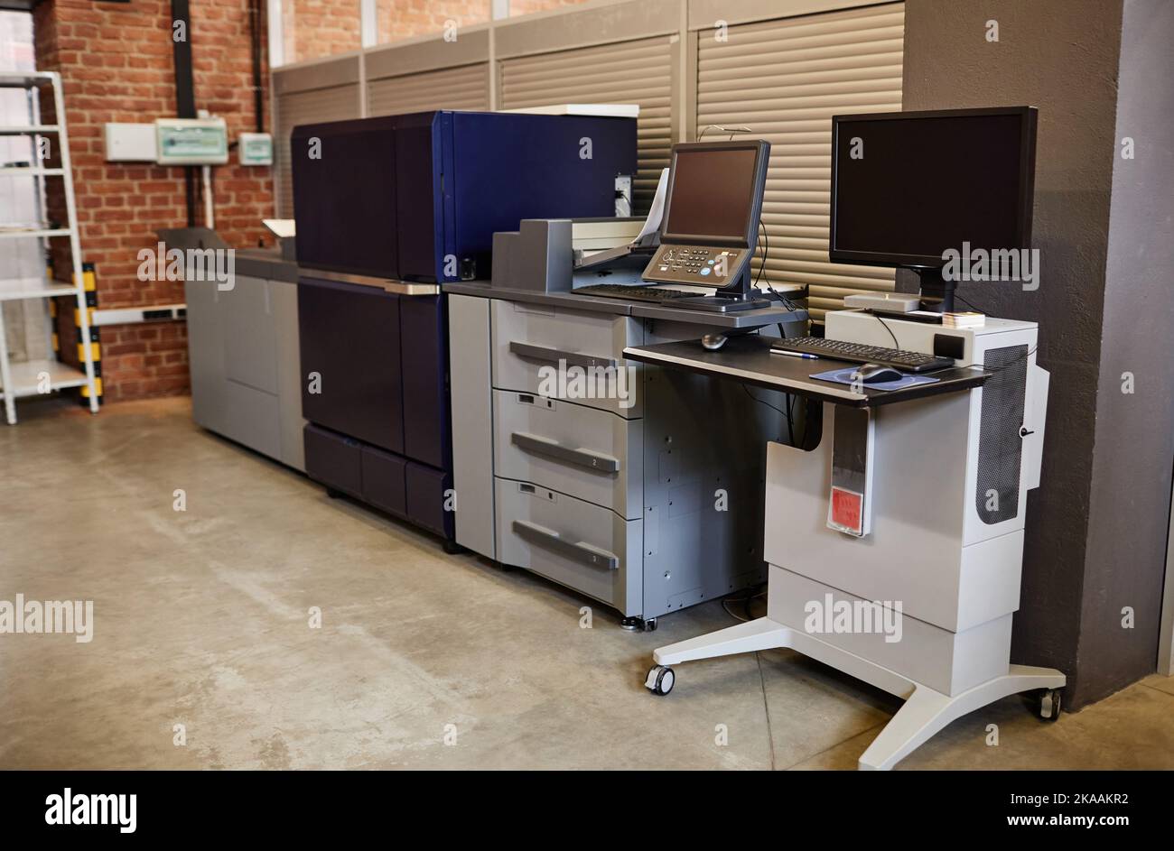 Background image of machine in printing factory workshop with computer ...