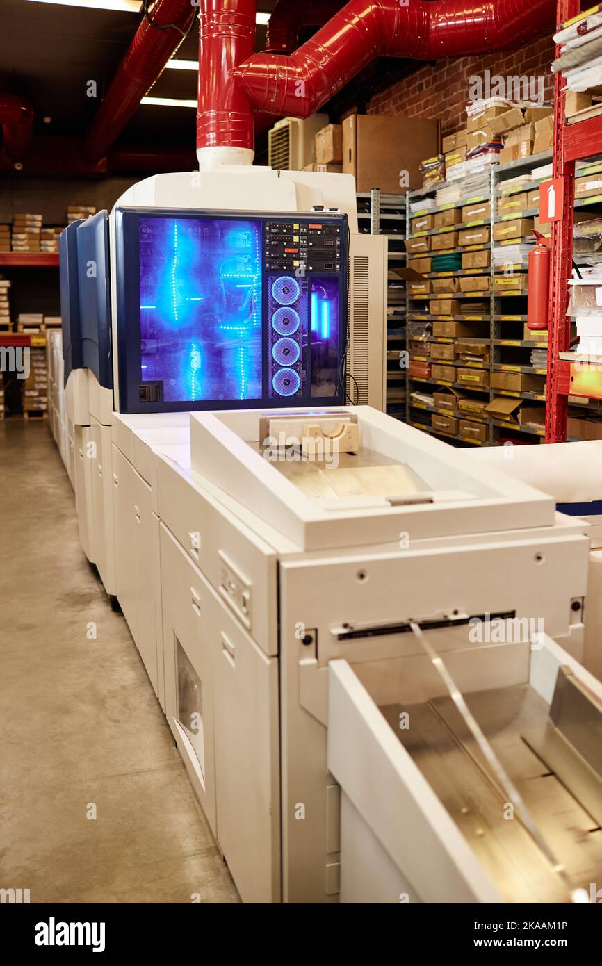 Background image of printing factory workshop with focus on glowing ...