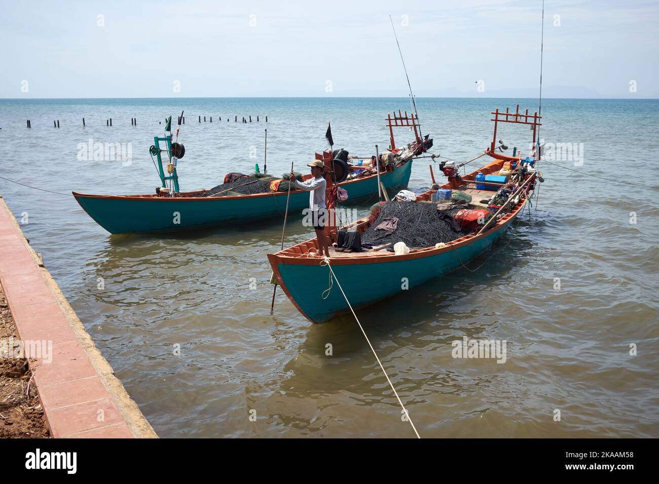 Traditional Fishing Boats near Kep Market in Cambodia Stock Photo - Alamy