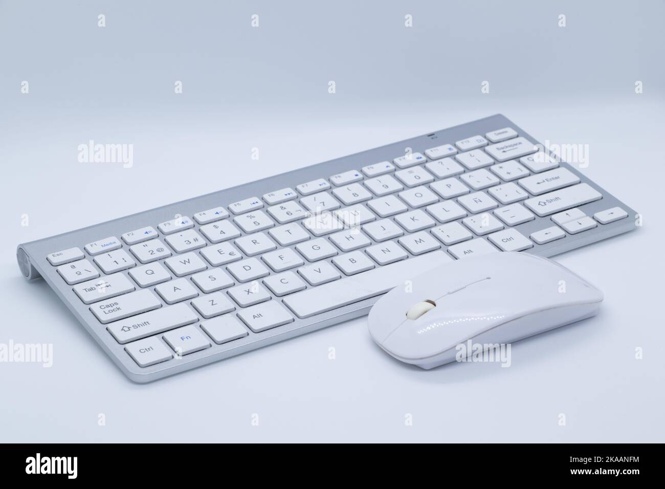 Gray and white keyboard and mouse Stock Photo - Alamy