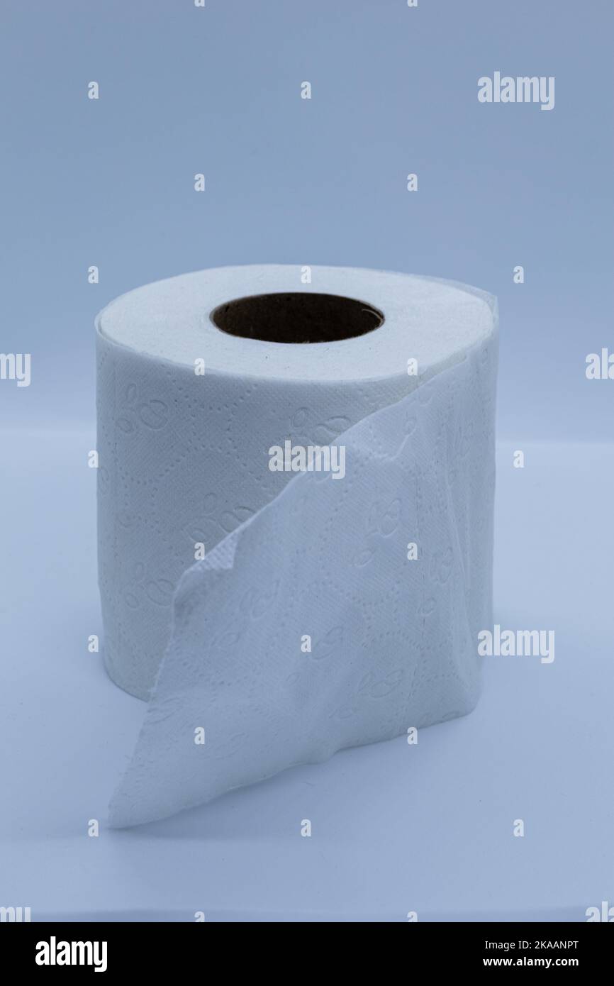 White toilet paper on a white background with contrast Stock Photo - Alamy