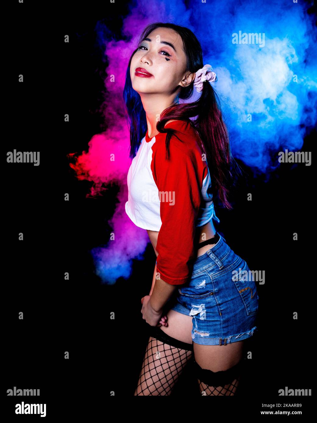 Cosplayer girl in harley quinn hi-res stock photography and images - Alamy