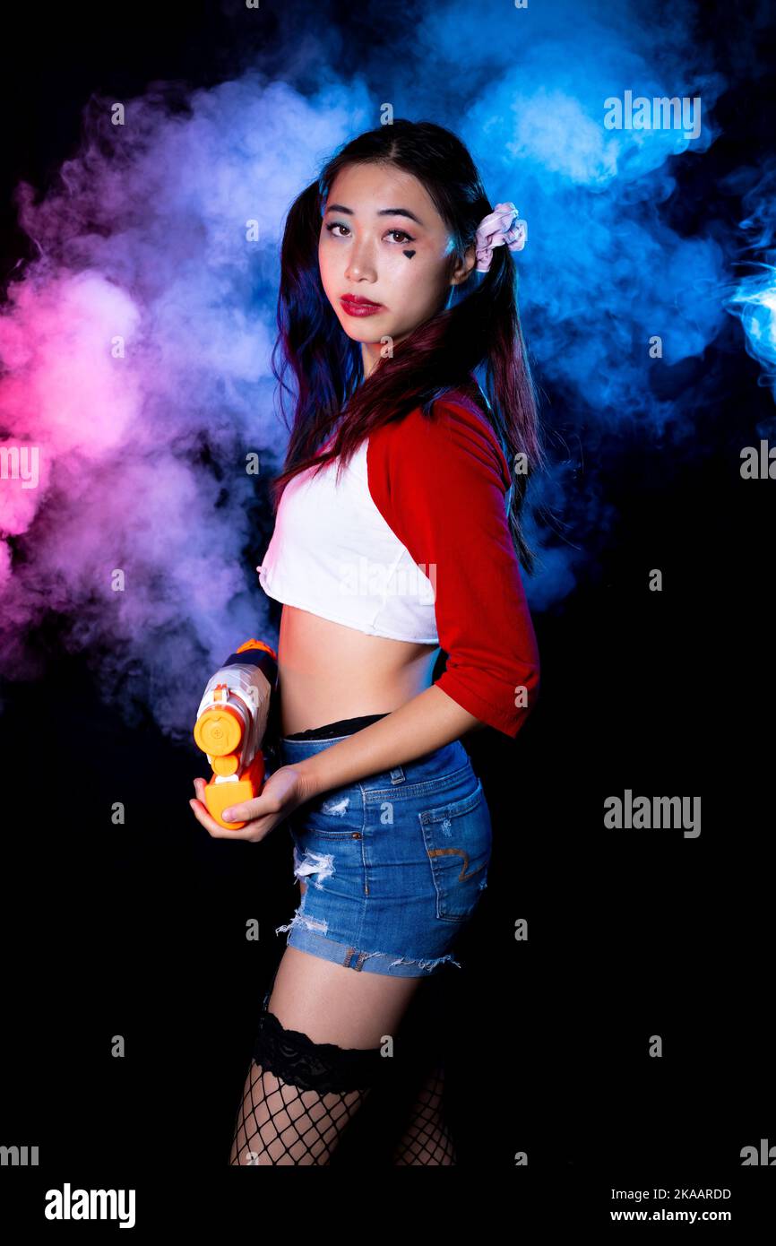 Cosplayer girl in harley quinn hi-res stock photography and images - Alamy