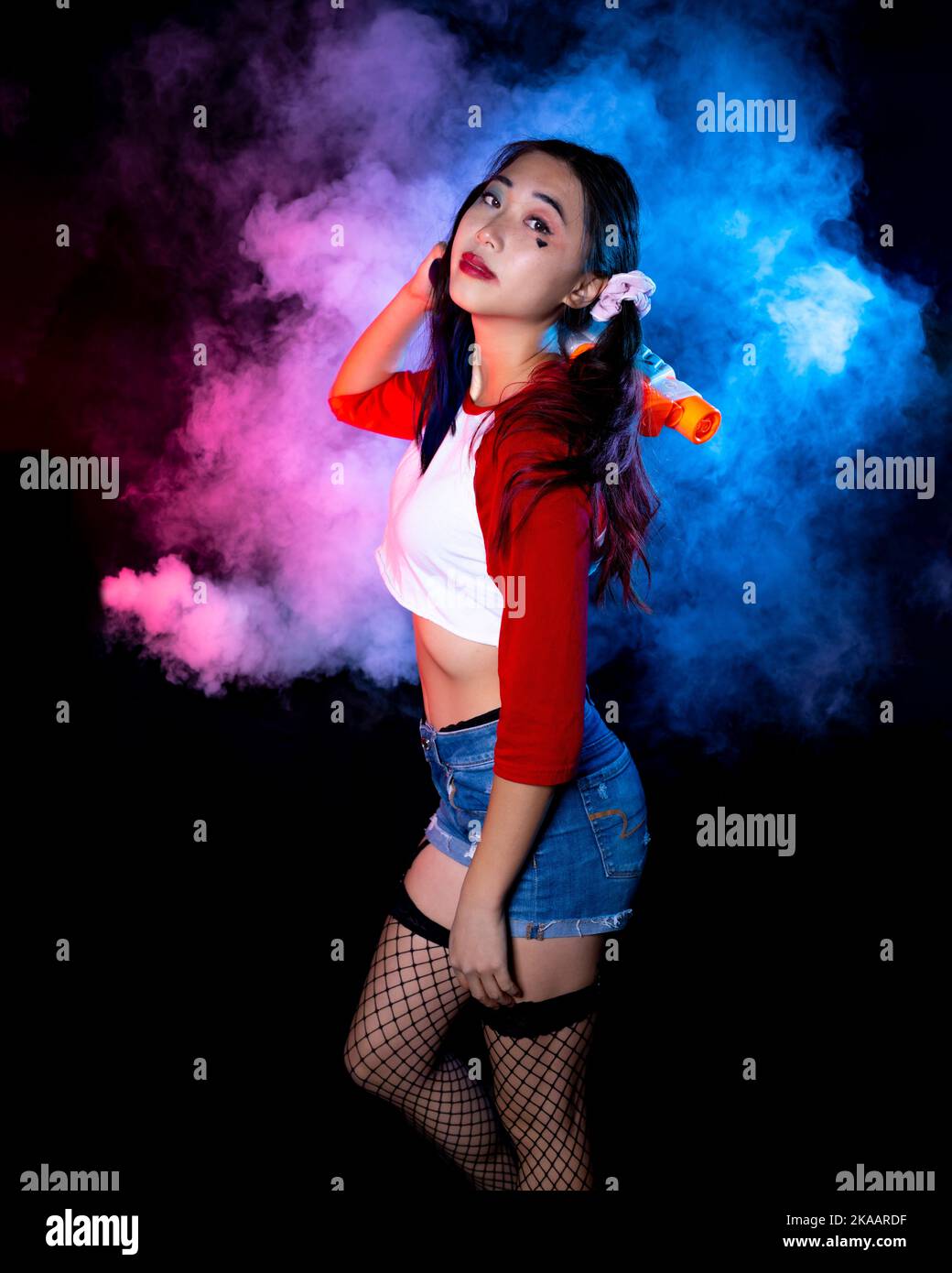 Cosplayer girl in harley quinn hi-res stock photography and images - Alamy