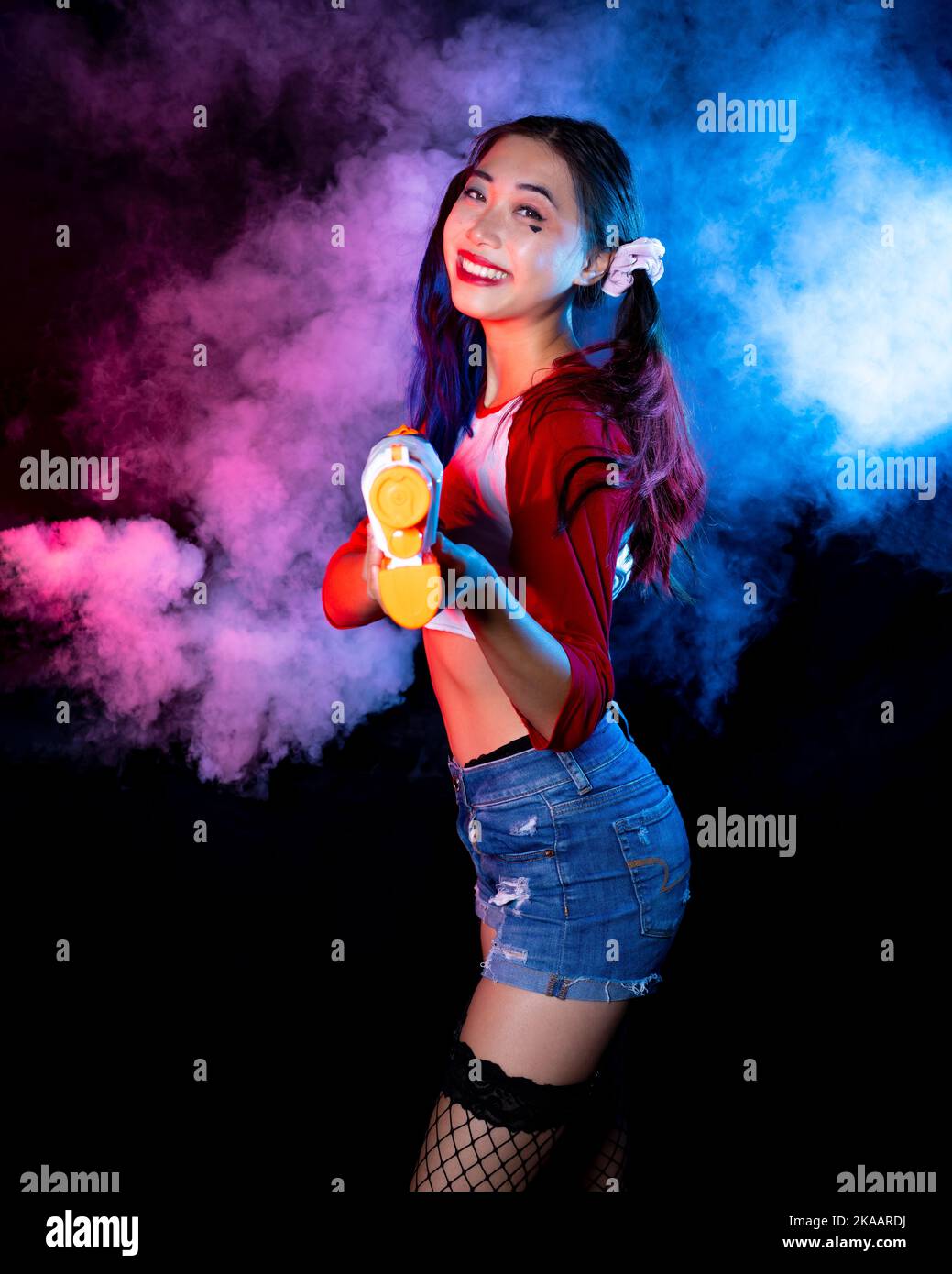 Cosplayer girl in harley quinn hi-res stock photography and images - Alamy