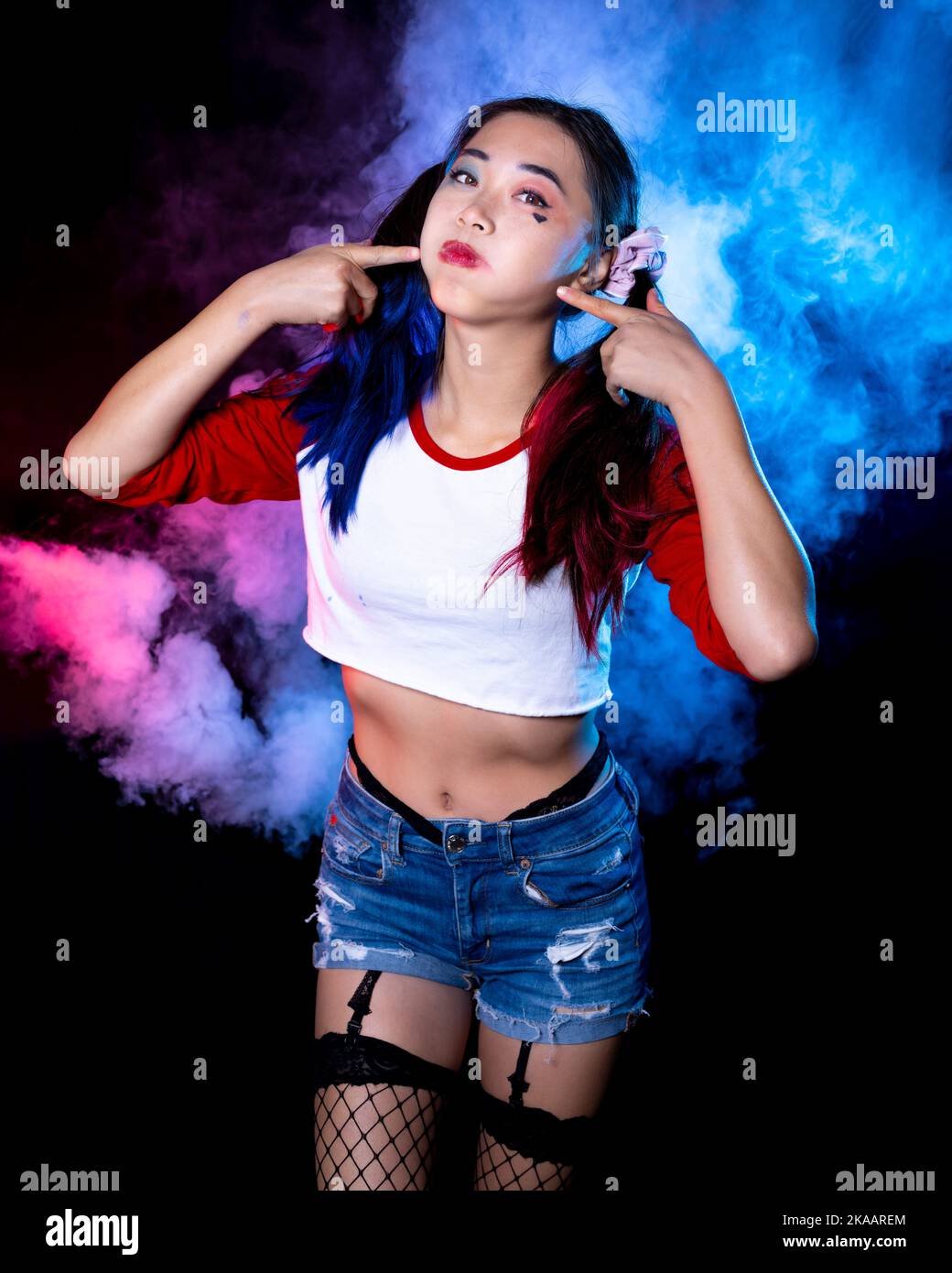 Cosplayer girl in harley quinn hi-res stock photography and images - Alamy