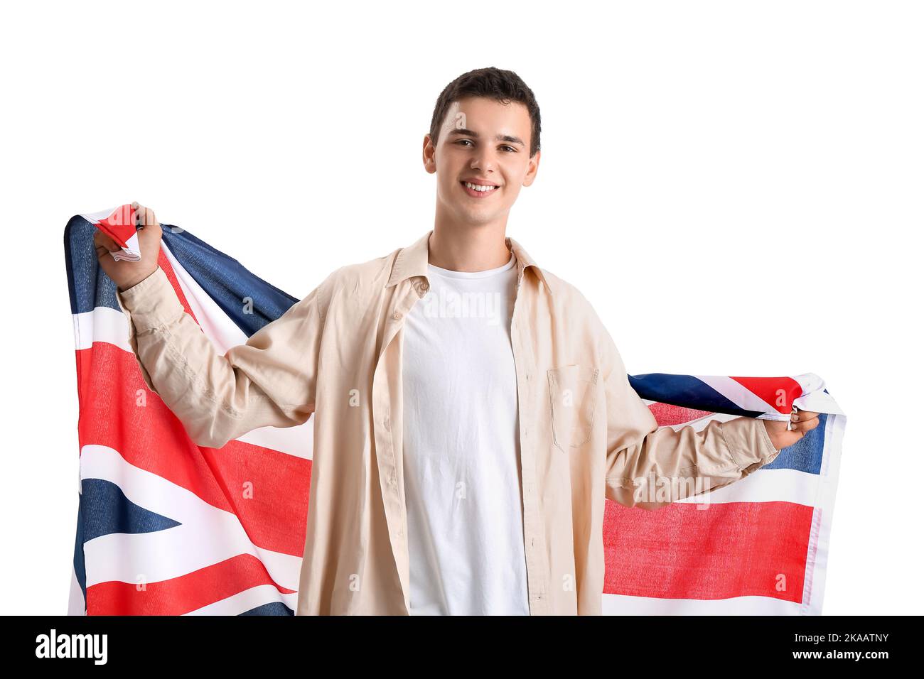 Teenage boy with UK flag on white background Stock Photo - Alamy