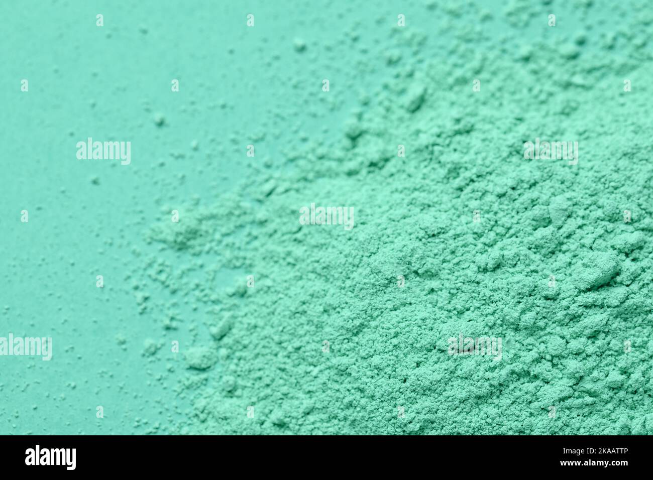 Closeup view of powder scattered on mint background Stock Photo - Alamy