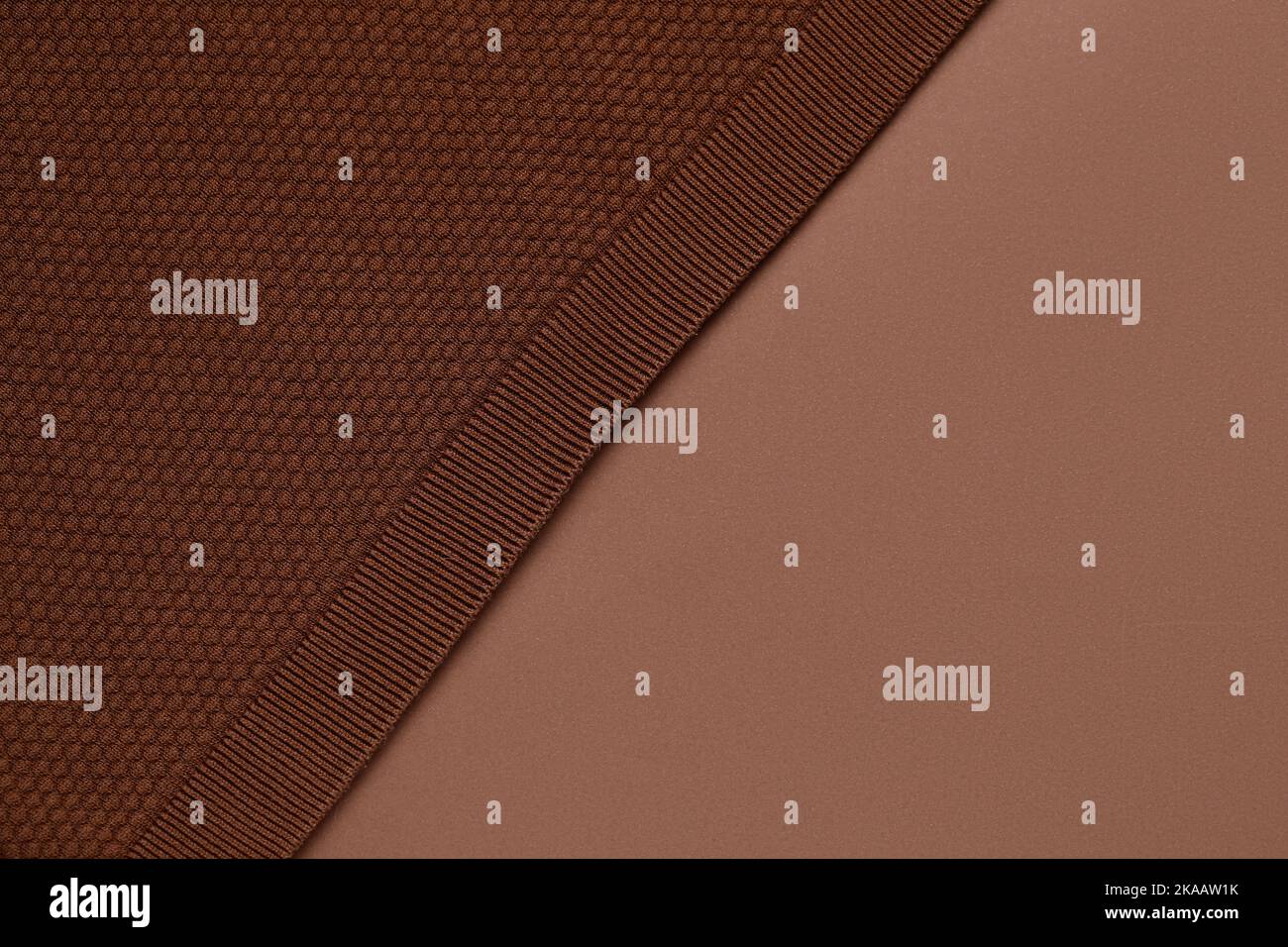 Fabric with pattern on brown background Stock Photo - Alamy