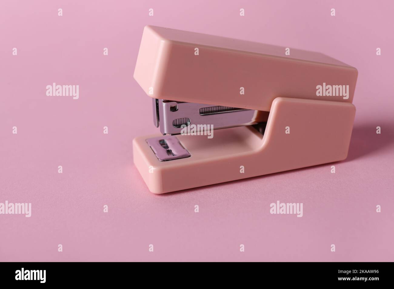 Pink stapler tool office hi-res stock photography and images - Alamy