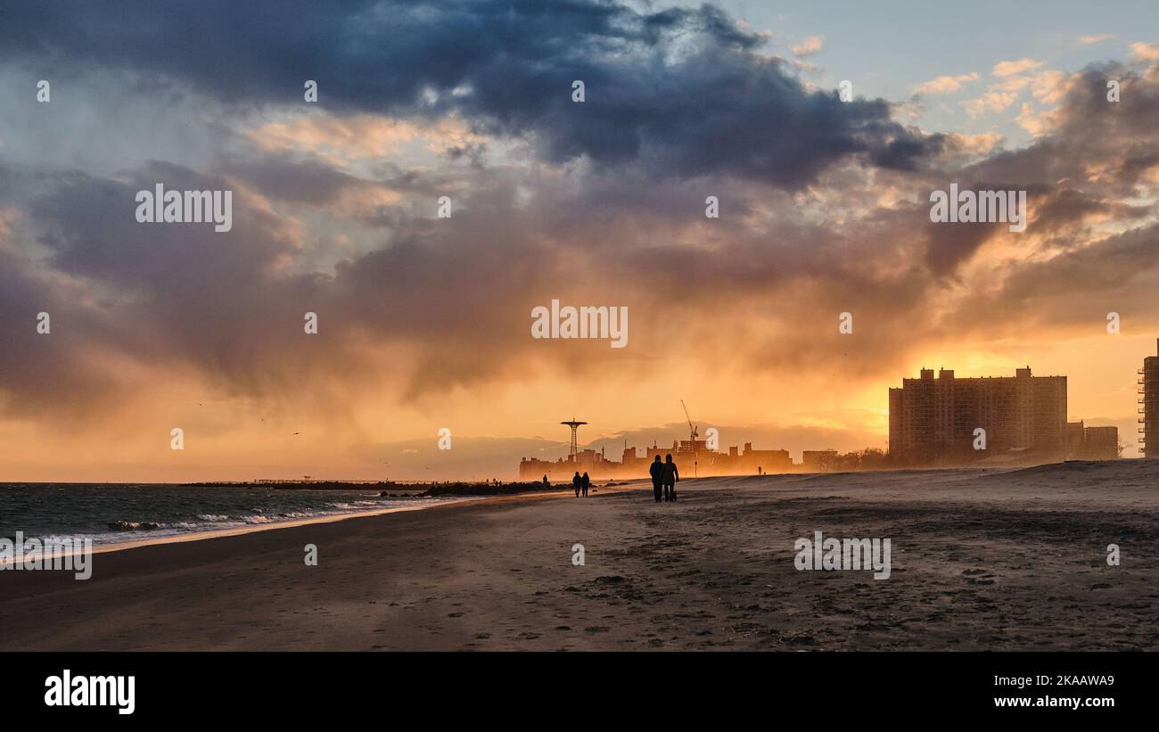 Sudden sand storm on the beach at Coney Island at Sunset during the ...