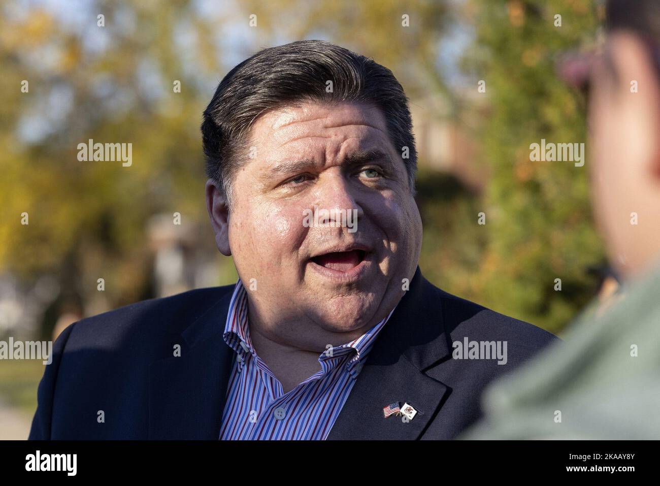 Illinois Gov. J.B. Pritzker greets constituents as he campaigns with ...