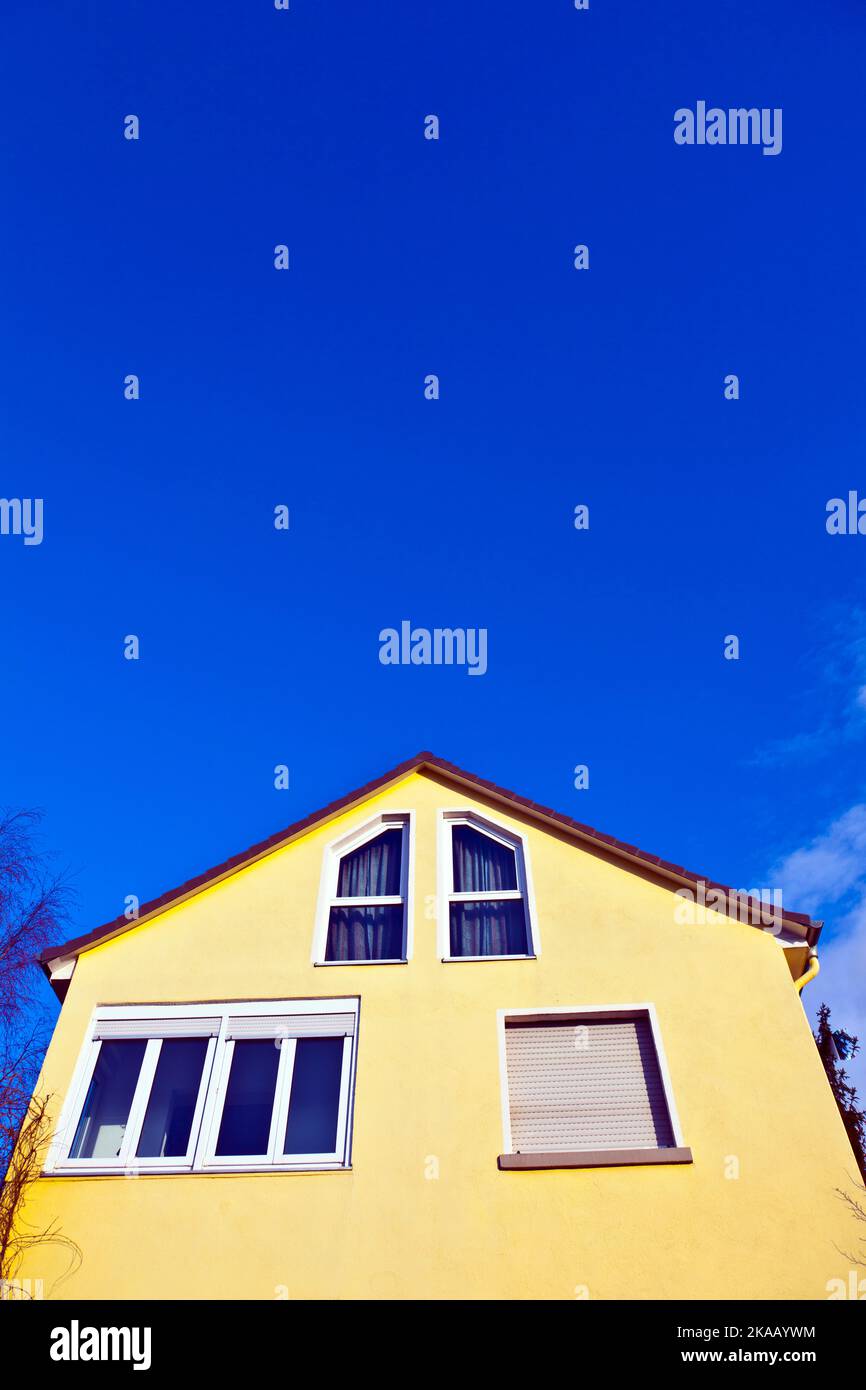 facade of house with blue sky Stock Photo - Alamy