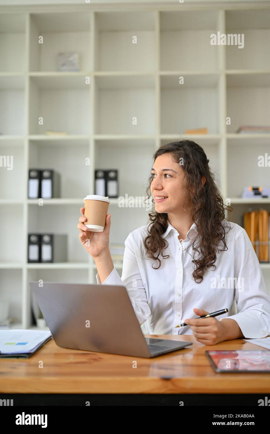 Portrait, Charming and successful millennial Caucasian businesswoman ...