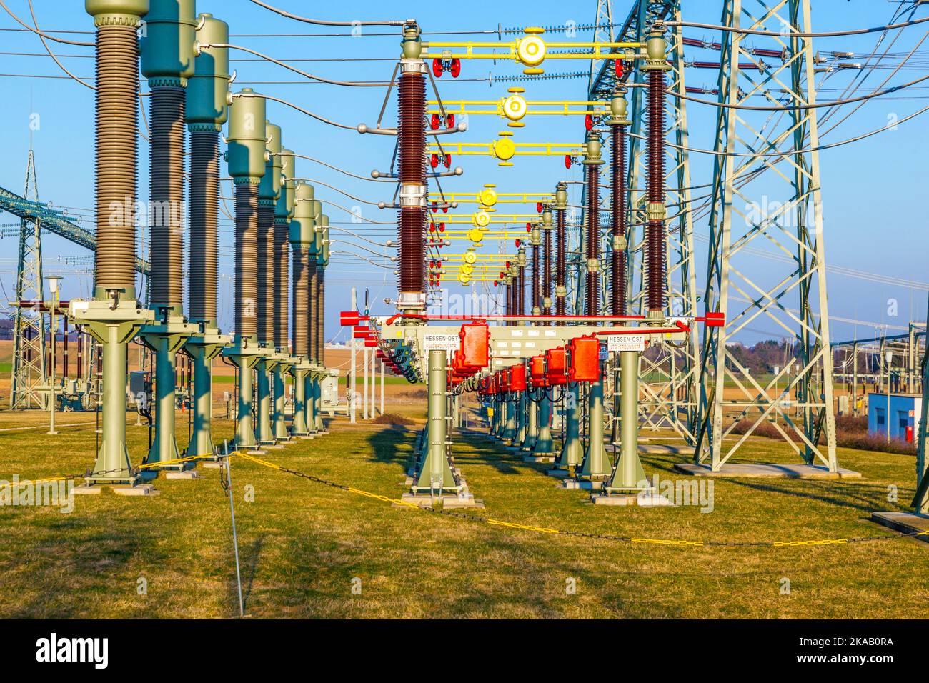 hight voltage tower in rural landscape with blue sky Stock Photo - Alamy