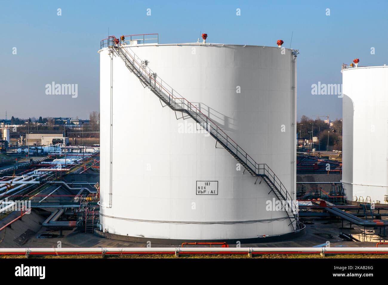 white tank in tank farm with blue sky Stock Photo - Alamy