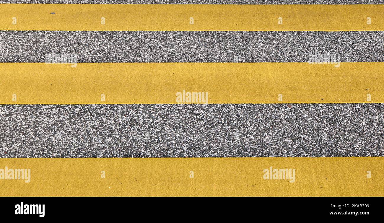 pedestrian crossing in yellow Stock Photo - Alamy
