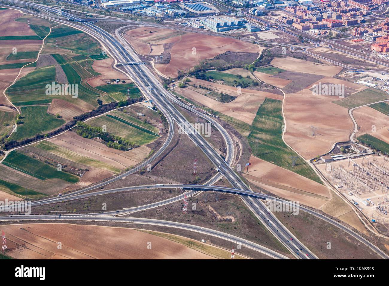 aerial of electrical pylon in rural area with highway Stock Photo - Alamy
