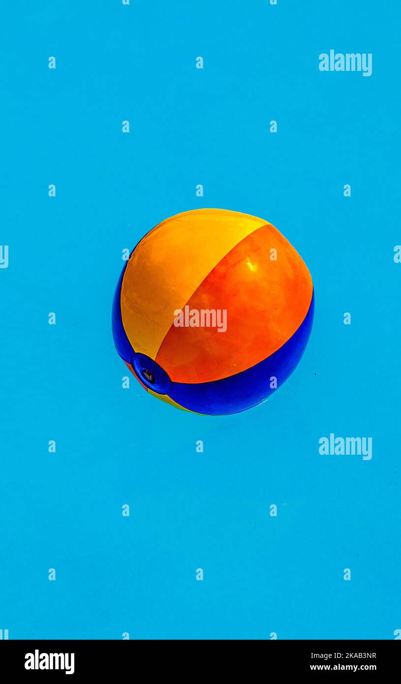 inflated plastic ball in the pool Stock Photo - Alamy