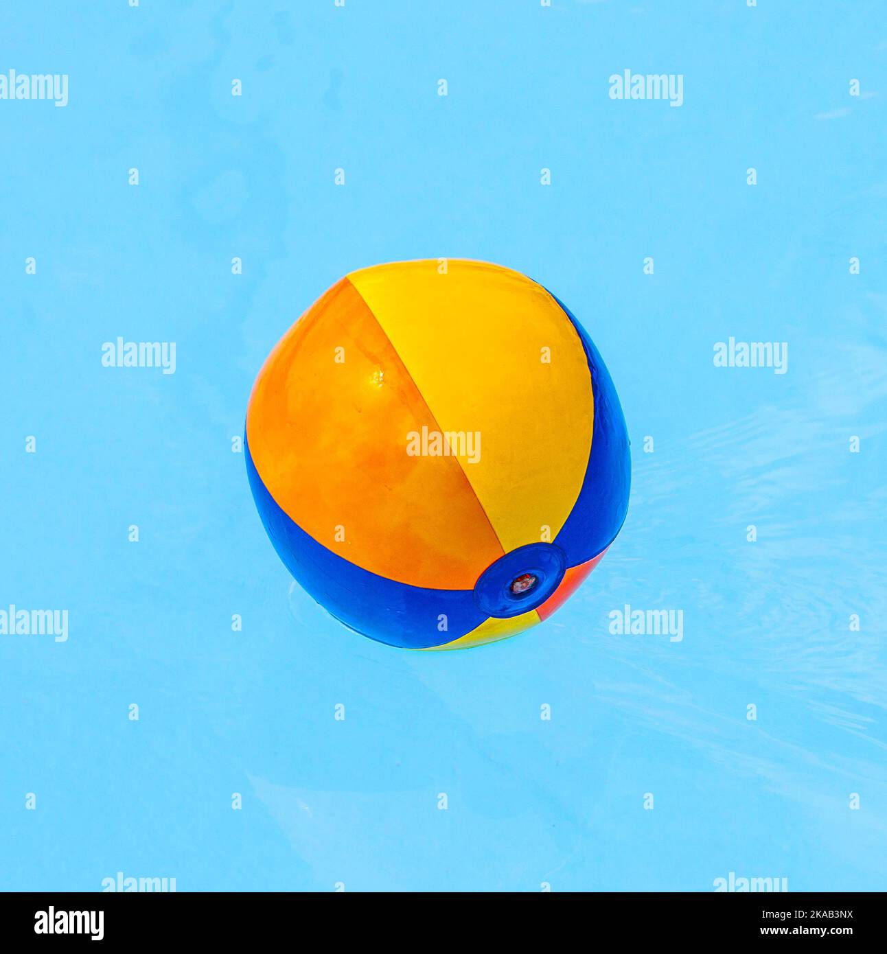 inflated plastic ball at the blue outdoor pool Stock Photo - Alamy