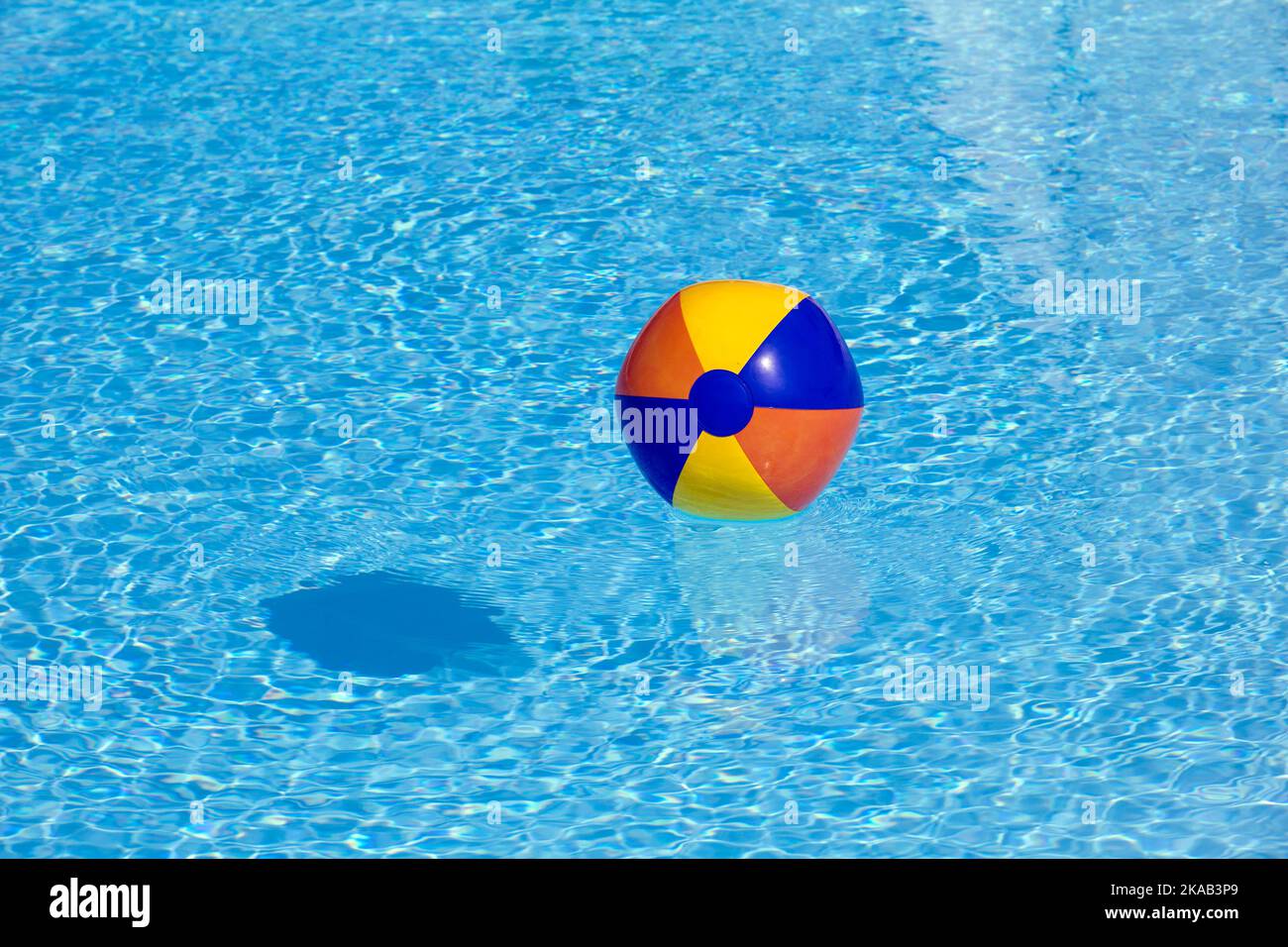 inflated plastic ball flying in the pool Stock Photo - Alamy