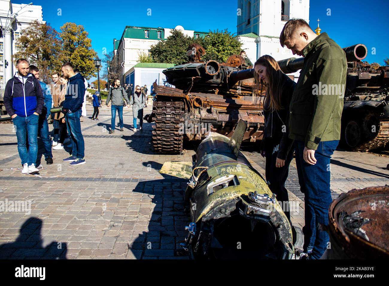 People visiting an open air exhibition and features Russian military ...