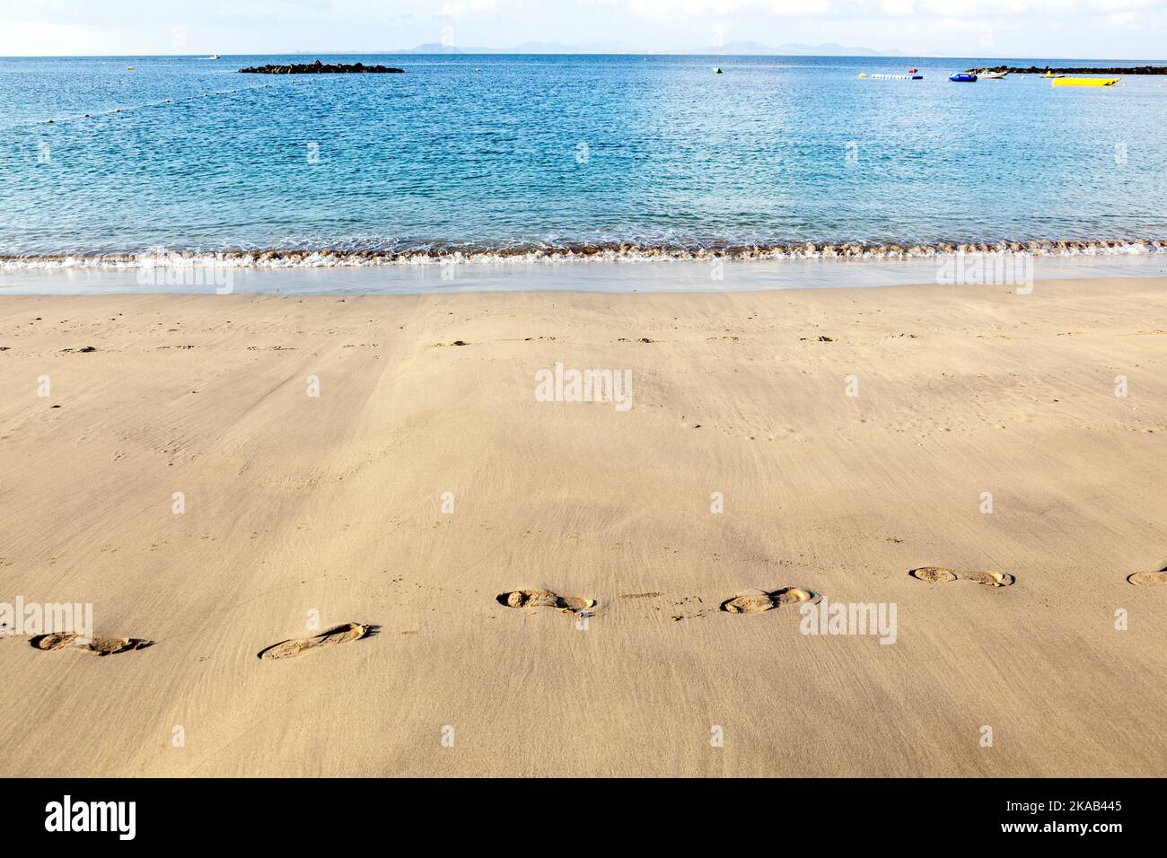 human footprints in the fine sand at the beach Stock Photo - Alamy