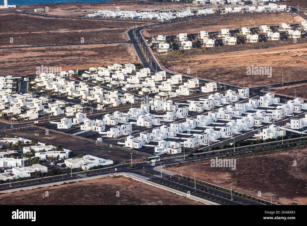 settlement of new houses all in same style Stock Photo - Alamy