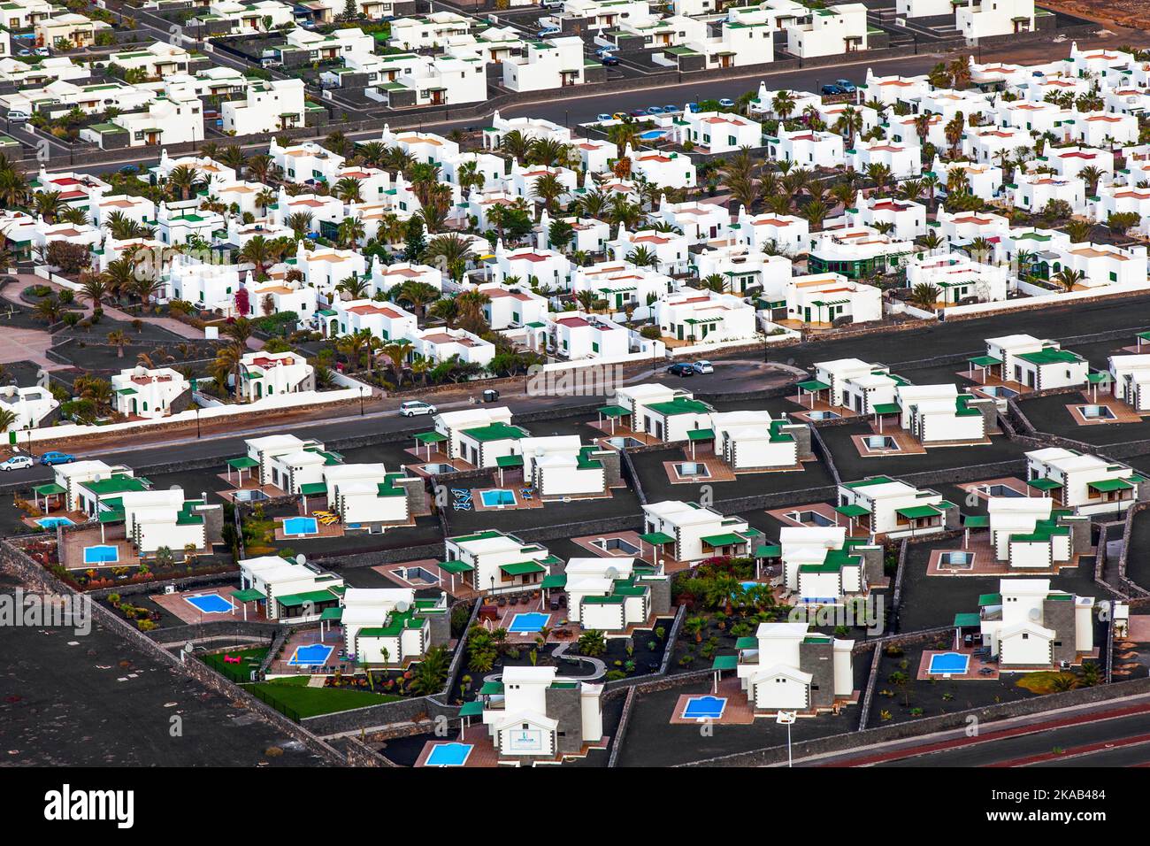 settlement of new houses all in same style Stock Photo - Alamy