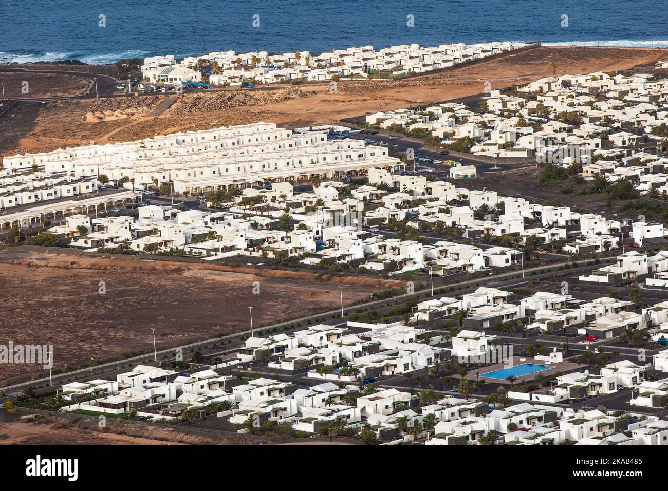 settlement of new houses all in same style Stock Photo - Alamy