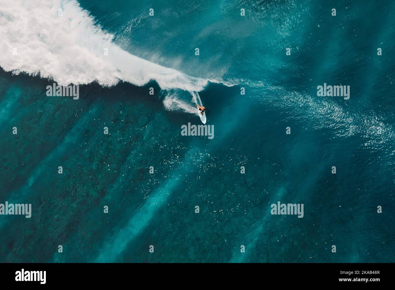 Aerial view with surfing on ideal wave. Perfect waves with surfers in ...