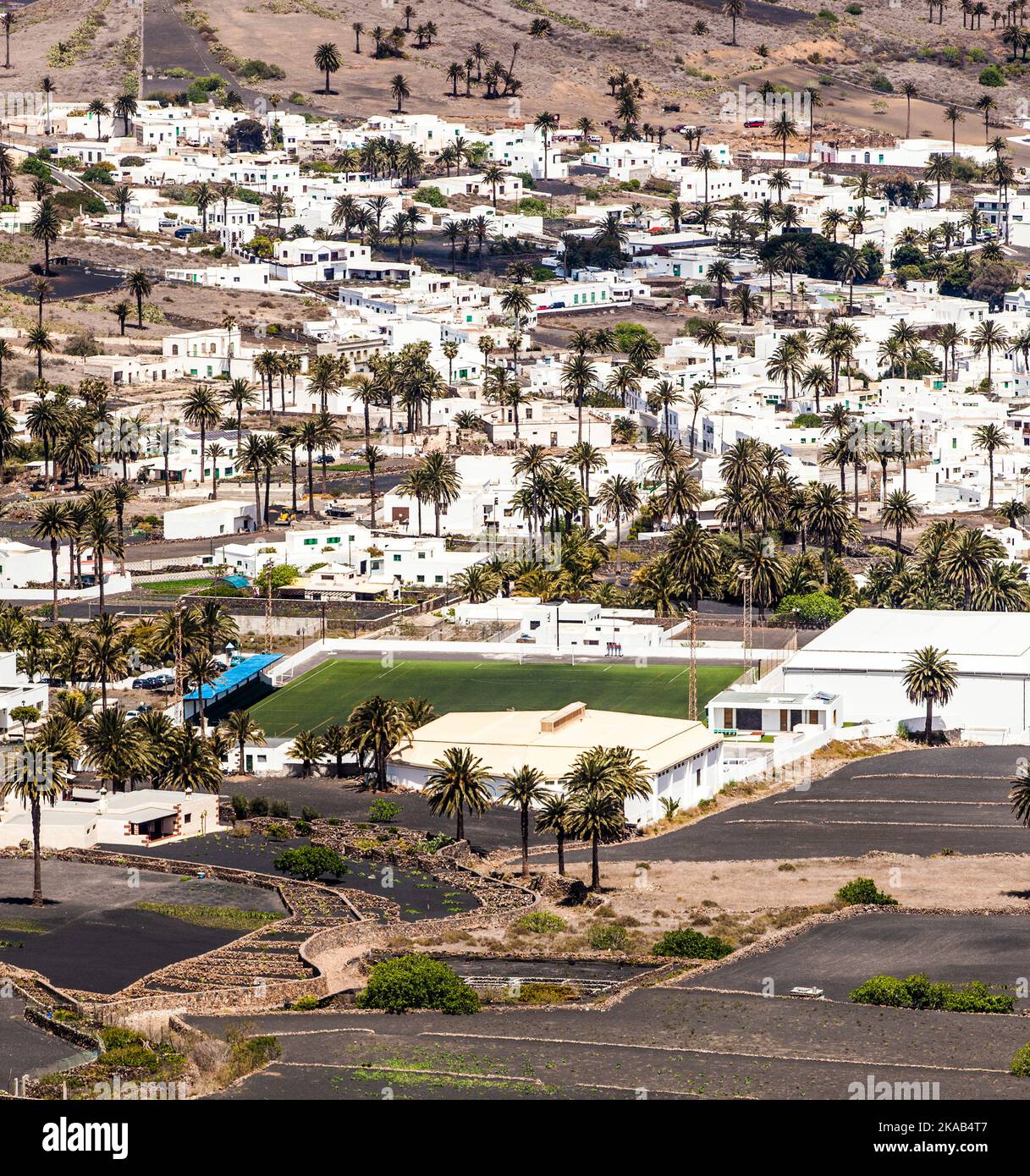 Small town of Haria in Lanzarote with palms in volcanic area Stock ...