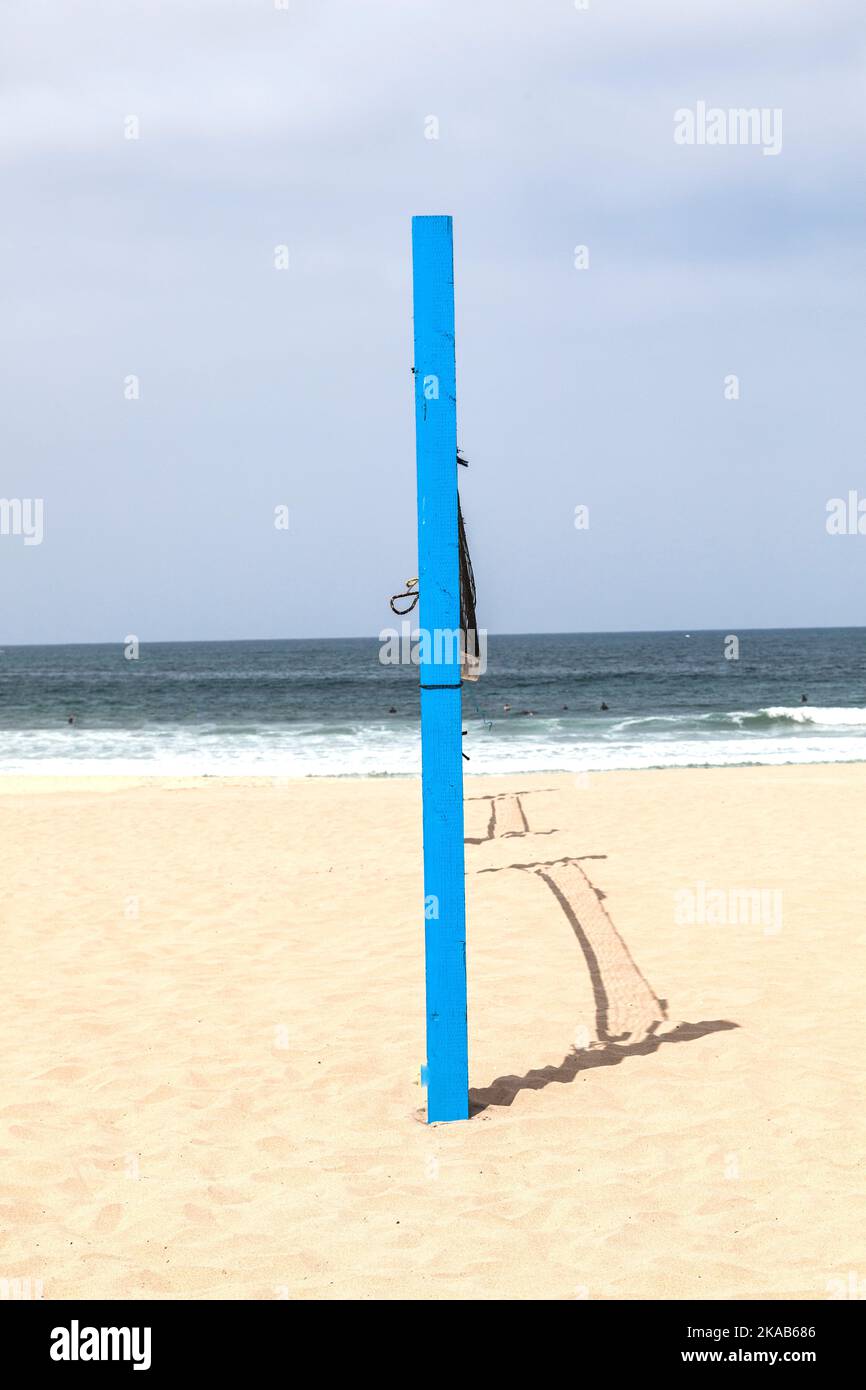 volleyball post at the beach in blue Stock Photo - Alamy