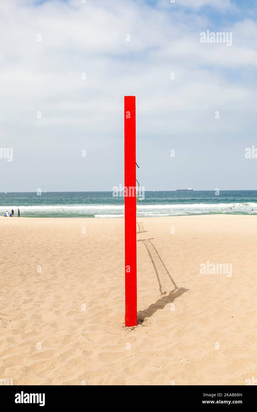 volleyball post at the beach in blue Stock Photo - Alamy