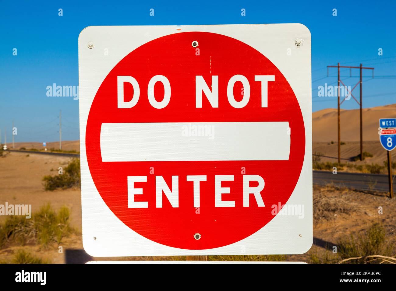 red do not enter Sign at the highway with blue sky Stock Photo - Alamy