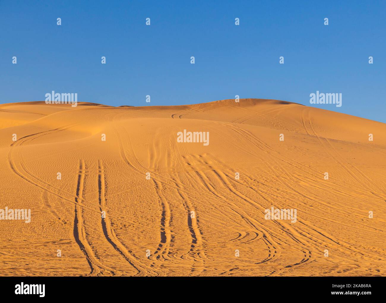 sand dune in the desert with marks of cars Stock Photo - Alamy