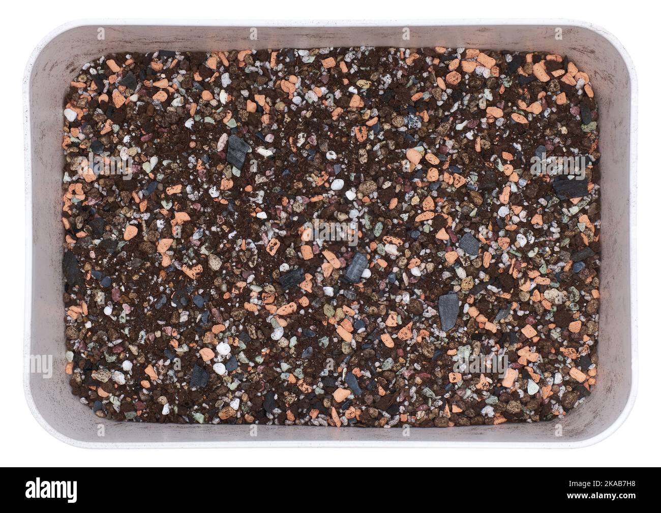 plastic box with substrate soil for transplanting houseplants isolated ...