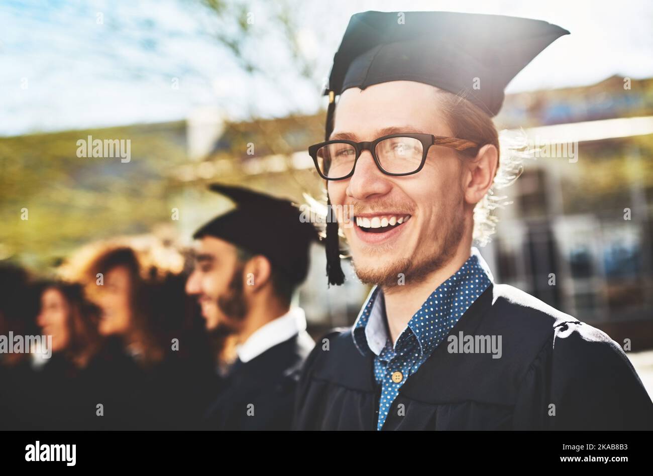 This day is everything and more. a smiling university student on ...