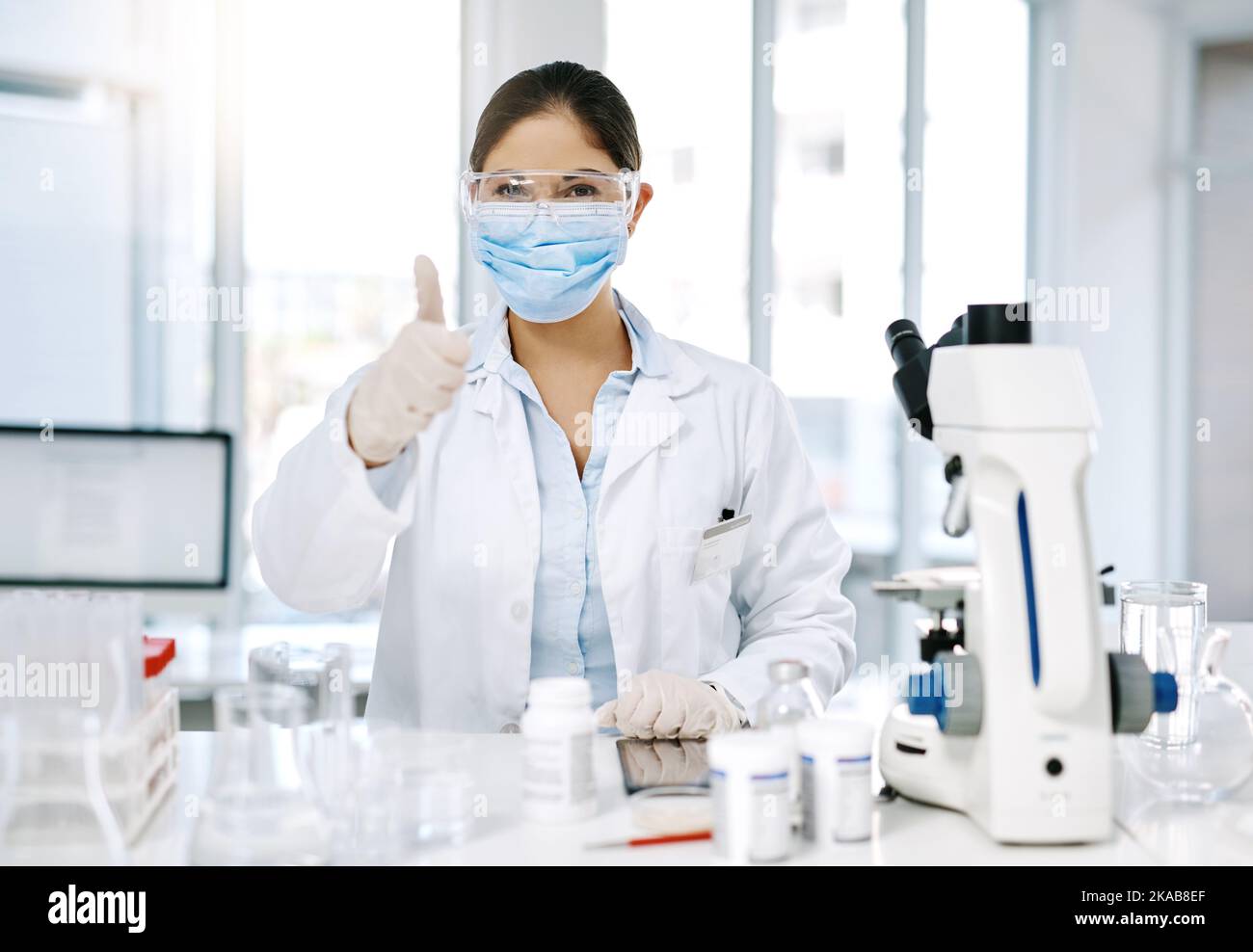 My experiment was a success. Portrait of a young scientist showing ...