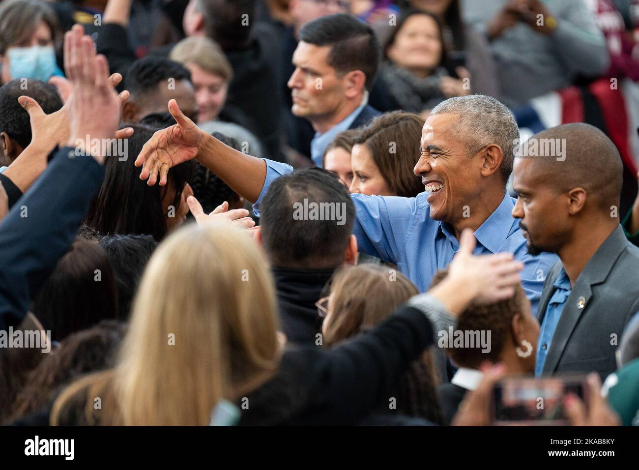 President Barack Obama interacts with supporters at the rally. Michigan ...