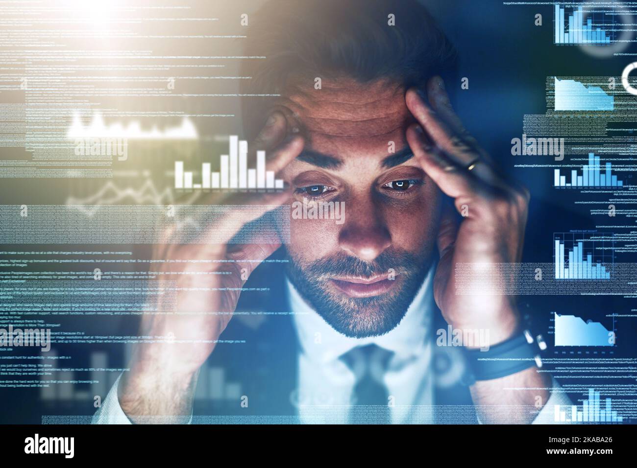 The life of a programmer. a young businessman looking stressed while coding late in the office ...