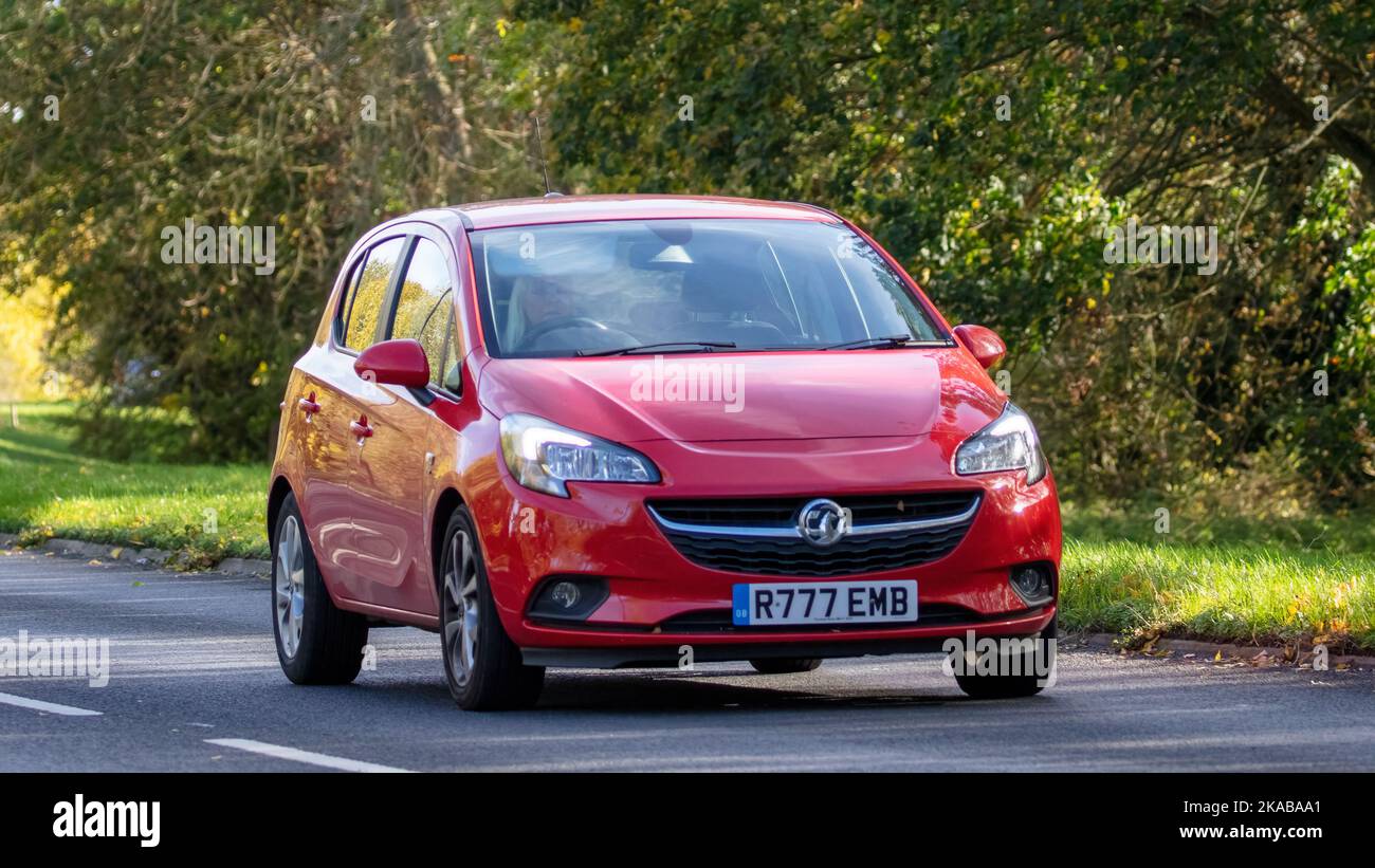 2016 red Vauxhall Corsa hatchback car Stock Photo - Alamy