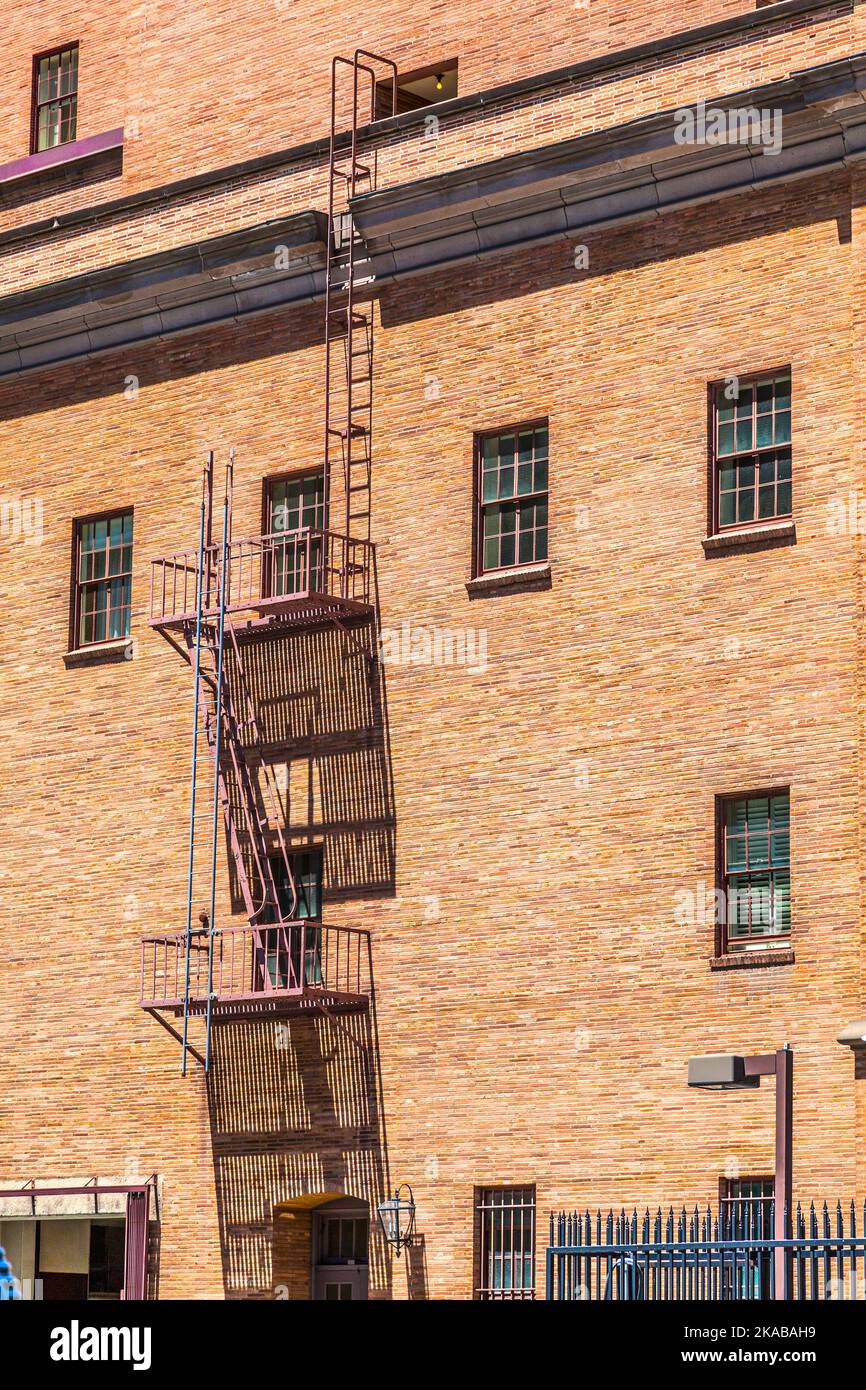 fire ladder at an old Brick house Stock Photo - Alamy