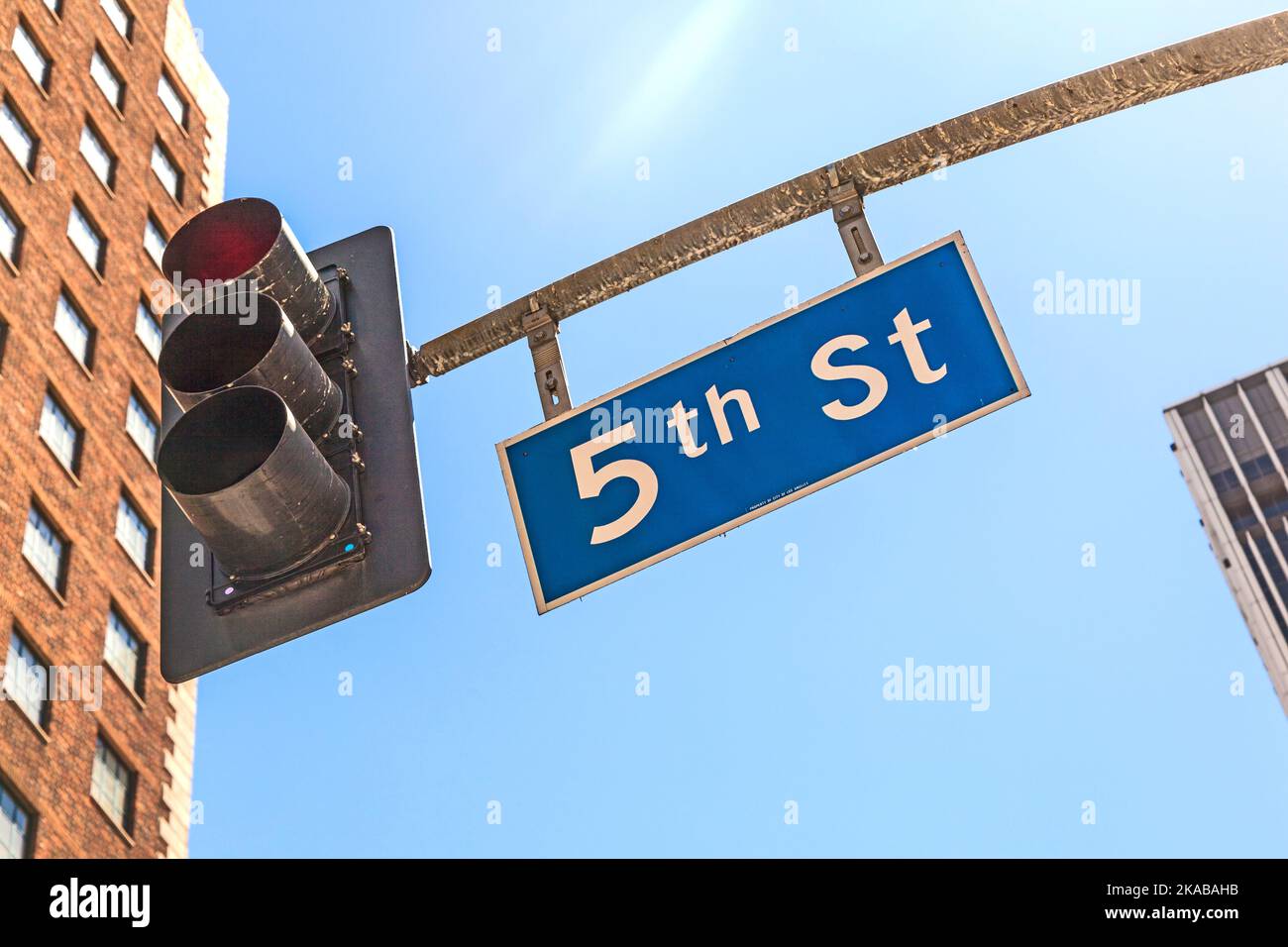 Downtown location sign street light hi-res stock photography and images ...