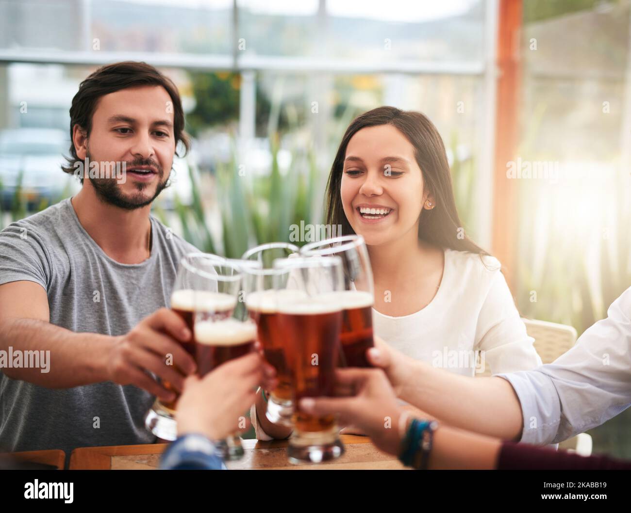 We have a lot to celebrate for. a group of young business colleagues ...